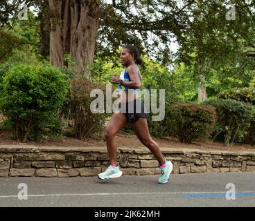 Sharon Firisua (SOL) competing in the women's marathon on day two of ...