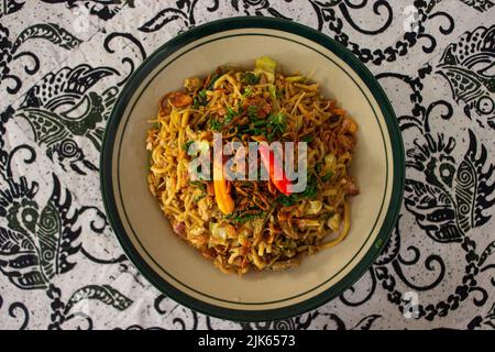 Mie Goreng Jawa or bakmi jawa or java noodle with spoon and fork ...