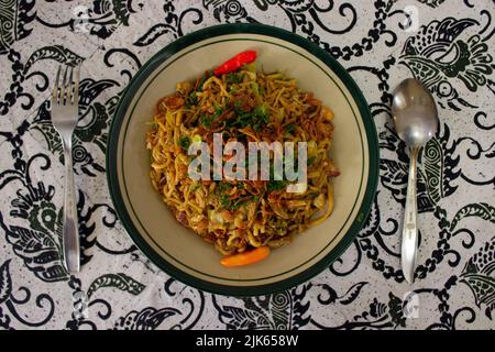 "Mie Goreng Jawa or bakmi jawa or java noodle with spoon and fork ...