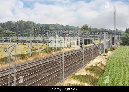 Cables and pole tower, electric train railway Stock Photo - Alamy