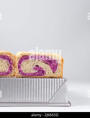 Two colored swirl bread, duo toned bread, purple bread, short loaf of ...