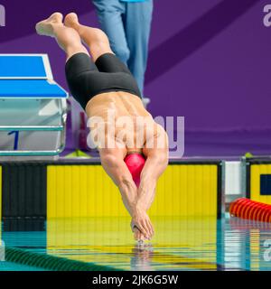 Adam BARRETT (ENG) dives in for the Men's 50m Butterfly Semi-Final 2 at ...