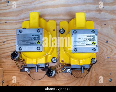 Radiation warning sign on the nameplate the mechanical container of ...