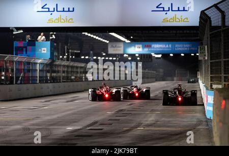 Drivers head down the start finish lane during the race during the 2022 ...