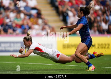 England's Megan Jones scores a try during the Women's Rugby World Cup ...