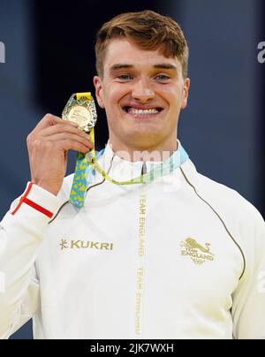 England's James Wilby, gold medal, centre, with Australia's Zac ...