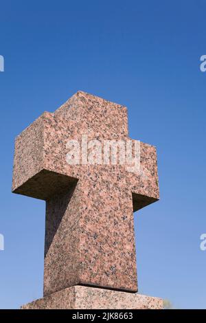 Close-up of granite cross atop a headstone in cemetery Stock Photo - Alamy