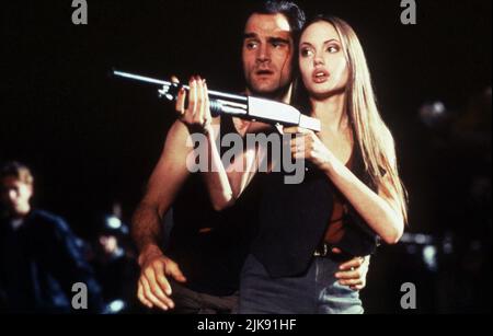 Angelina Jolie & Elias Koteas Film: Cyborg 2 (1993) Characters: Casella ...