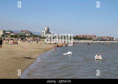 Kaspiysk, Russia. 31st July, 2022. Tourists go to the beaches of the ...