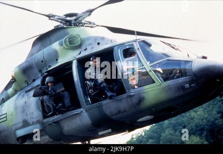 THE PEACEMAKER, George Clooney (in helicopter) filming a scene on set ...