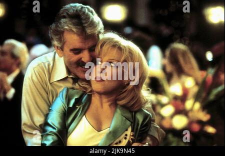 Dennis Farina and Bette Midler in the movie That Old Feeling, 1997 ...