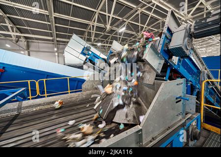 Production line with conveyors at waste recycling plant Stock Photo - Alamy