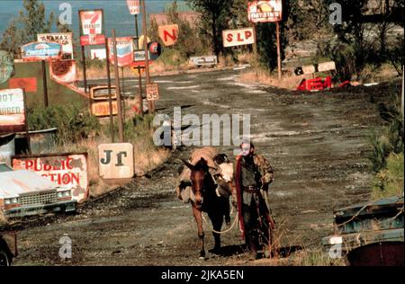 Film Still from "The Postman" Kevin Costner, Olivia Williams, Tom Petty ...