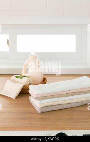 aesthetic laundry concept detergent and towel Stock Photo - Alamy