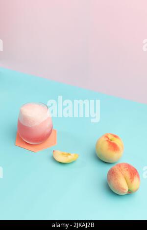 summer background with peach ade drink with peaches fruit Stock Photo ...