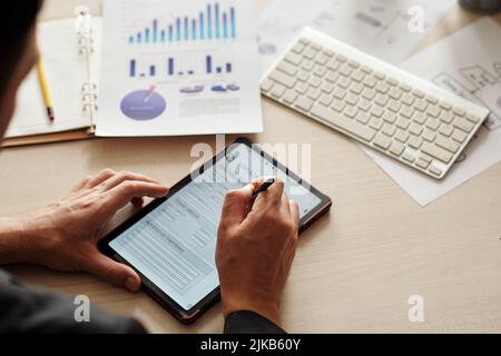 Close-up Of Businessman Filling Online Survey Form On Hybrid Laptop ...