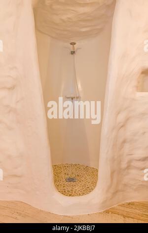 Bathroom inside modern cave for rural tourism Stock Photo - Alamy