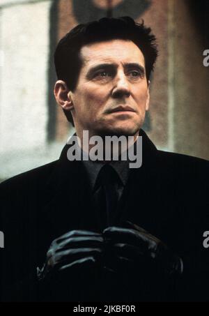 GABRIEL BYRNE, END OF DAYS, 1999 Stock Photo - Alamy