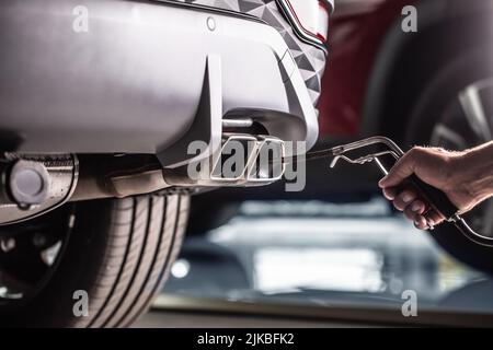 Measurement of exhaust emissions at the technical inspection station. A ...