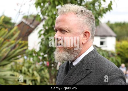 Artist Colin Davidson, arrives for the funeral of former Northern ...