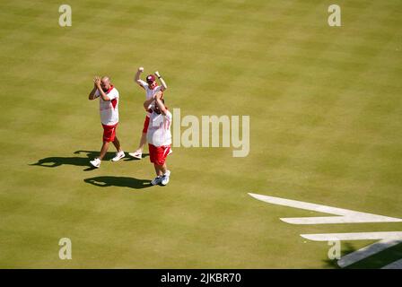 England's Nick Brett, Louis Ridout and Jamie Chestney celebrate winning ...