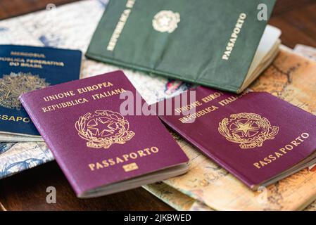 Brazilian and Italian passports on an ancient map of South America ...
