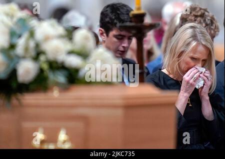 Harry Gration's widow Helen Chene with sons Harrison (left) and Harvey ...