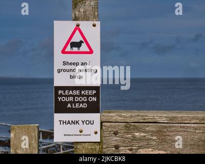 Warning sign to protect ground nesting birds Stock Photo - Alamy