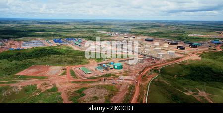 An aerial shot of modern factories in an industrial area in the ...