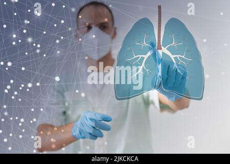 The doctor looks at the hologram of Lungs, checks the test result on ...
