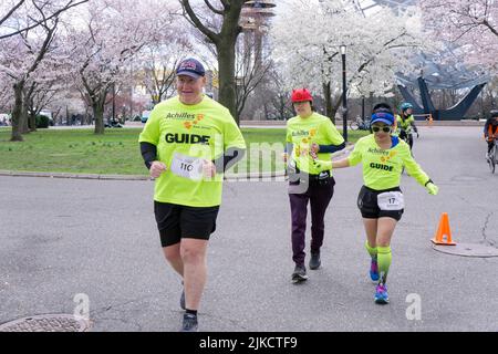 Runners with Achilles International track club cross the Verrazano ...