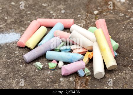 Close up multicolor sidewalk chalk pieces Stock Photo - Alamy