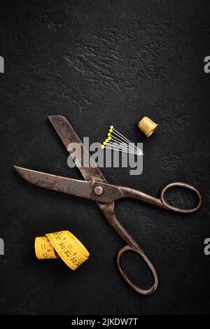 thimble and sewing pins on dark backdround Stock Photo - Alamy