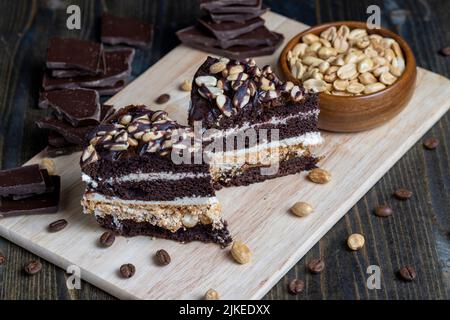 chocolate cake with nut filling and peanuts, dessert of chocolate cake ...
