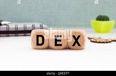 Word dex. Wooden small cubes with letters isolated on white background ...