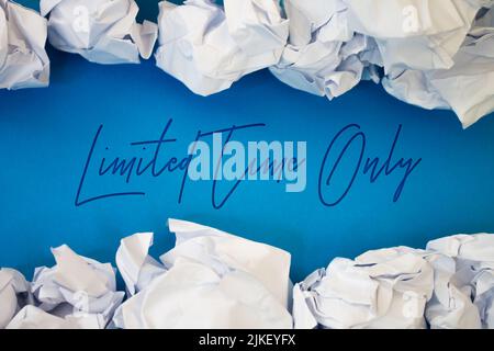 Limited Time Only text with Torn, Crumpled White Paper on colored ...