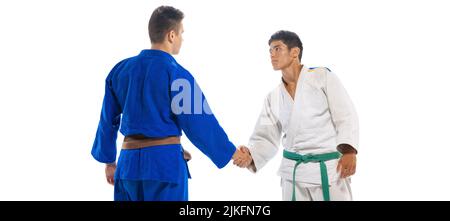 Men, karate and handshake at training fight for respect, fitness or ...