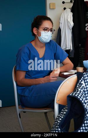 Students during a debriefing session after a resuscitation simulation ...