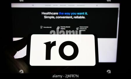 Smartphone with website of telehealth company Roman Health Ventures Inc ...