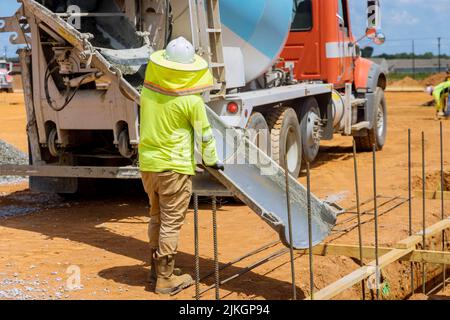 Concrete trenches are poured as a foundation for a house, and are used ...