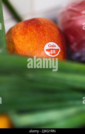 Fresh apple with sticker Stock Photo - Alamy