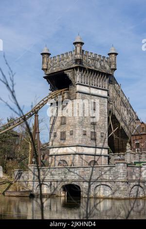 Vertical shot of a roller coaster in an amusement park Stock Photo - Alamy