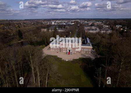 Facade of Slot Zeist castle with the moated manor surrounded by green ...