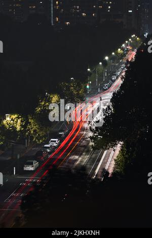 Long exposure shot on a street during night time Stock Photo - Alamy