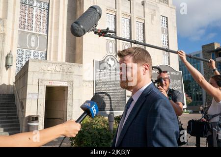 Austin, TX, USA. 2nd Aug, 2022. Family attorney MARK BANKSTON speaks to ...