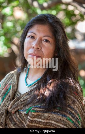 Isleta Pueblo Woman dressed in shawl and turquoise beads. Santa Fe New ...