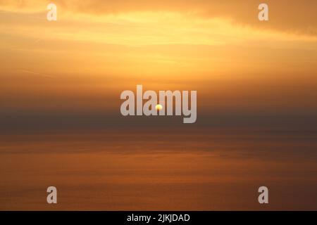 A mesmerizing scenery of sunset sky Stock Photo - Alamy