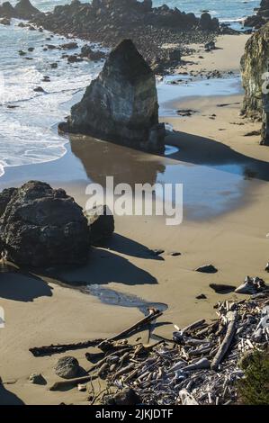 The vertical shot of a lake view with sunlight on the water at sunset ...