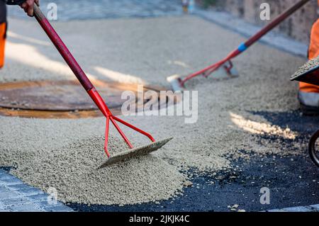 Asphalting with colored asphalt, construction site, construction of a ...
