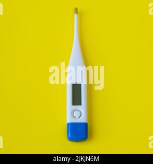 Yellow Digital Thermometer Isolated on White Background Stock Photo - Alamy